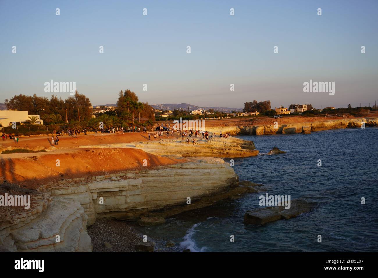 Landscape of cliffs surrounded by the sea under the sunlight in Paphos ...