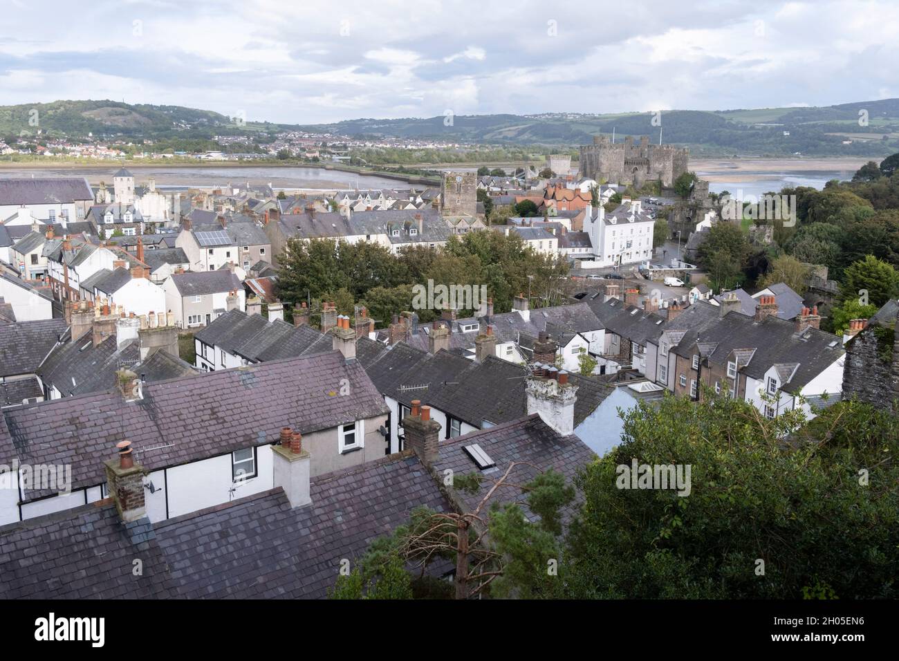 Seen from the ramparts of medieval Conwy castle are the rooftops of ...