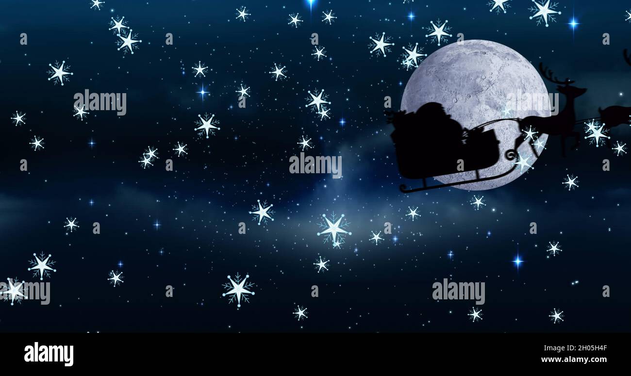 Image of santa claus in sleigh with reindeer at christmas, over snow ...