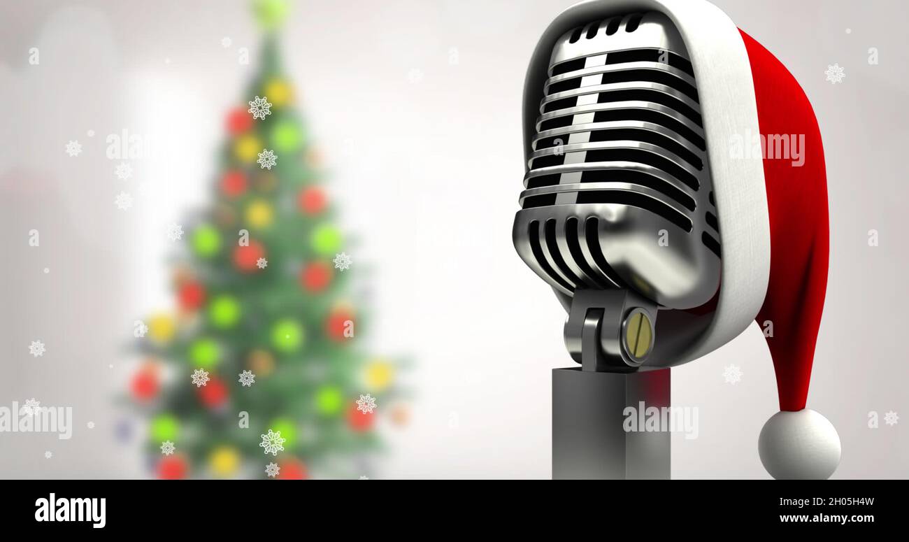 Image of retro microphone over christmas tree Stock Photo - Alamy