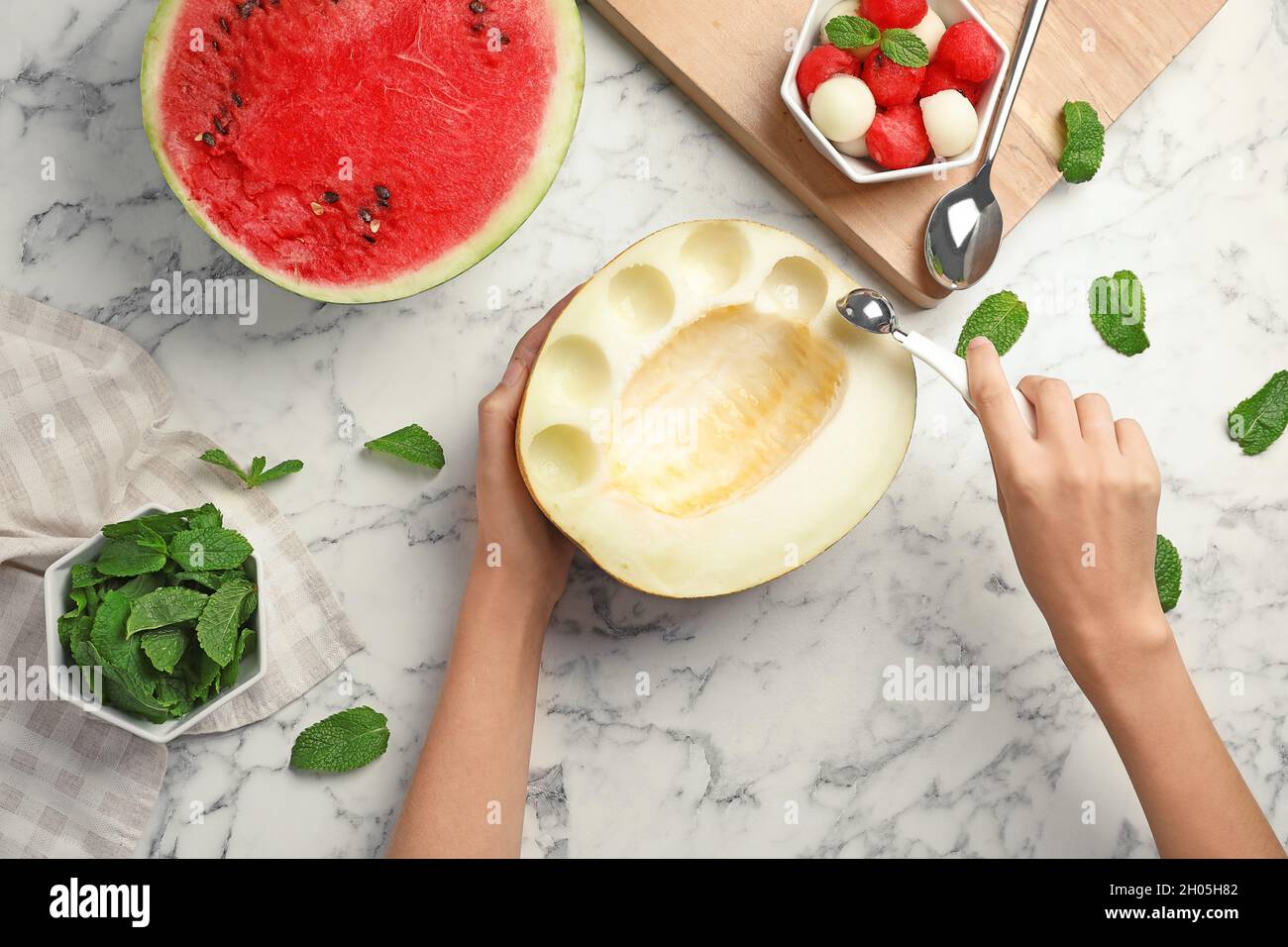 Making melon balls hi-res stock photography and images - Alamy