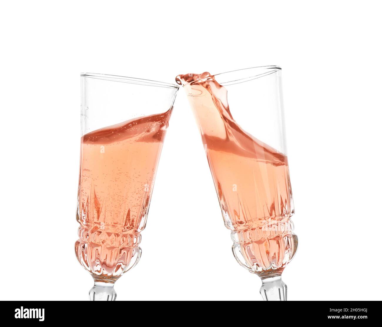 Toasting with glasses of rose champagne on white background Stock Photo ...