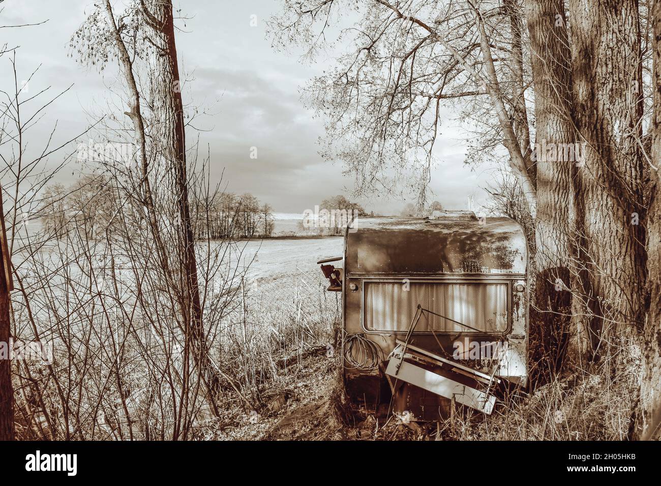 Old rusty camper abandoned in nature Stock Photo - Alamy