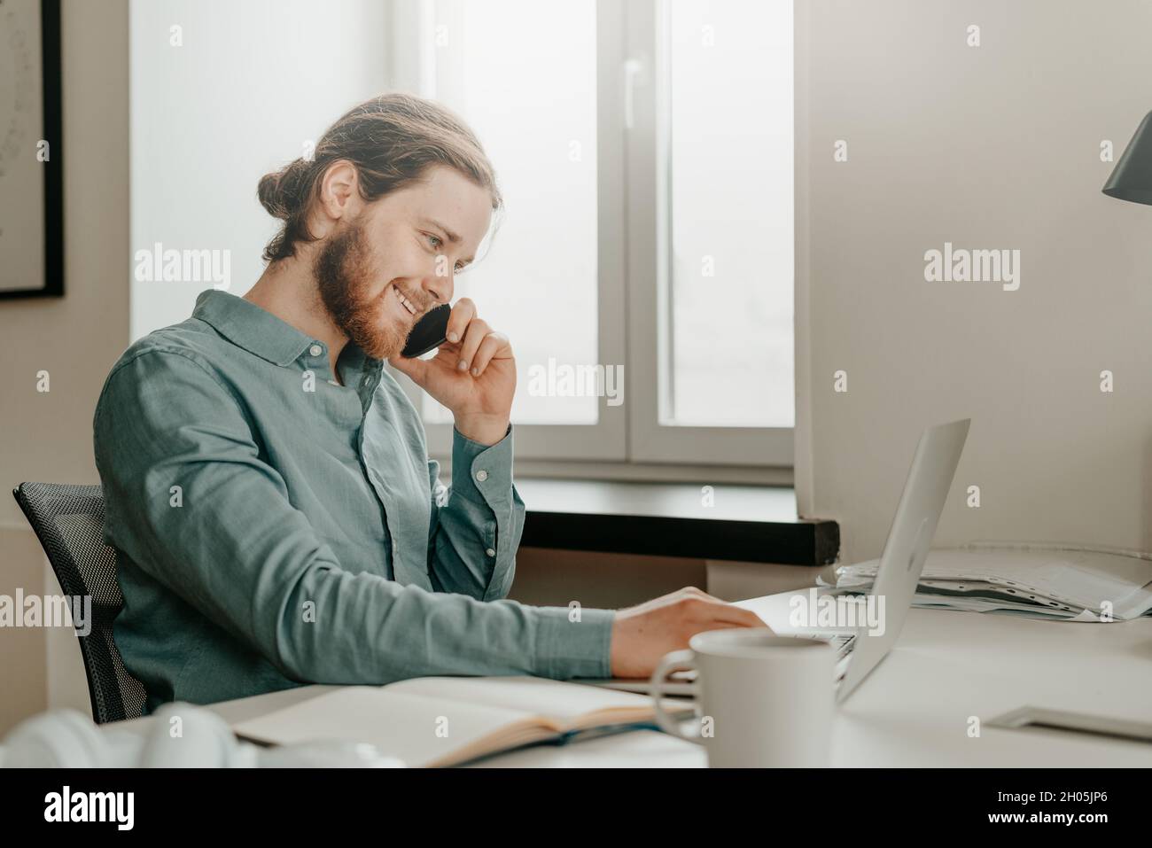 Successful man talking mobile assistant hi-res stock photography and ...