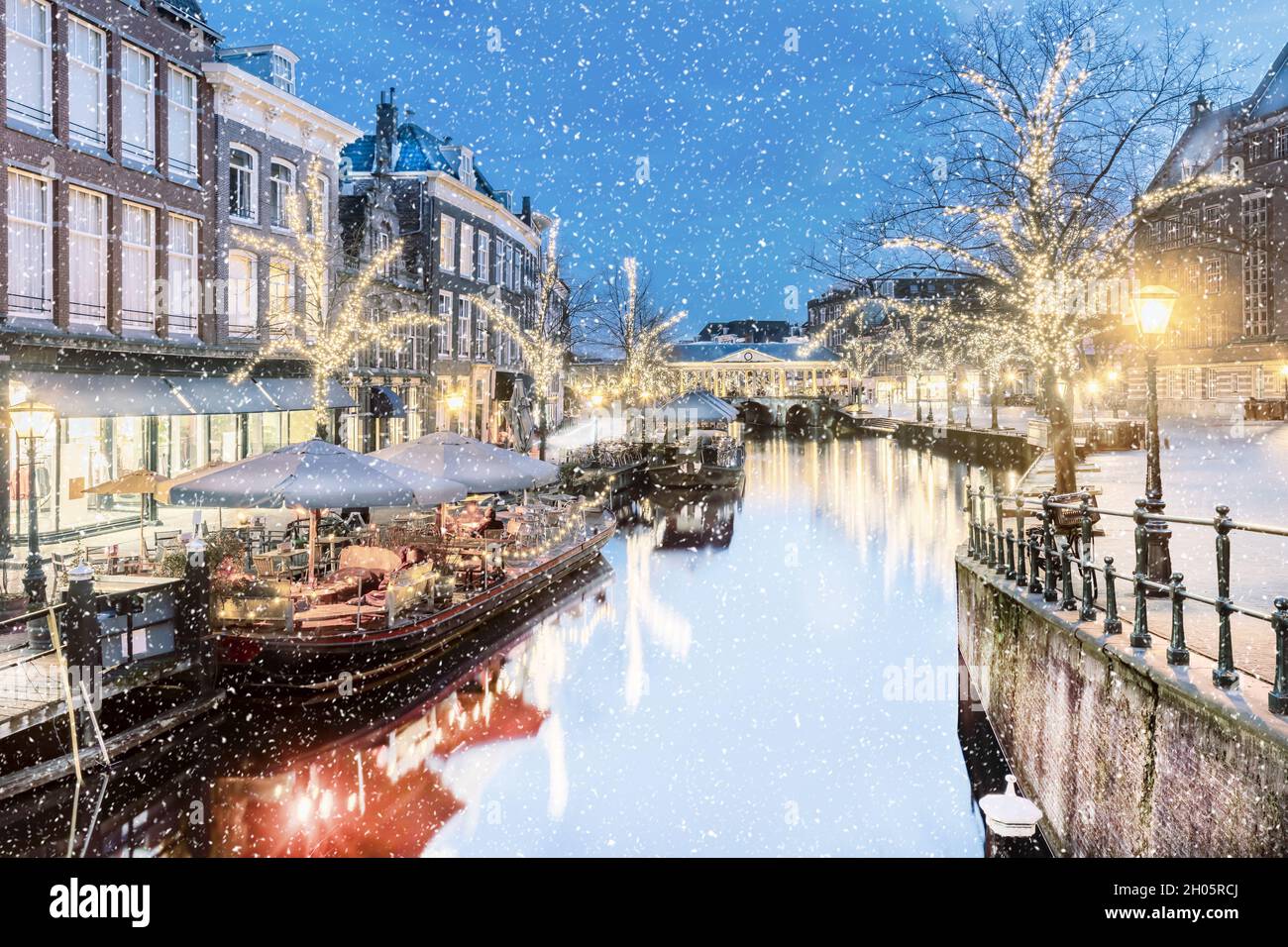 Ancient view of the Dutch Oude Rijn canal with bridge, historic ...