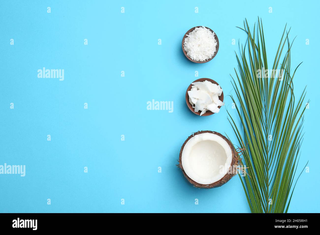 Composition with coconut flakes on color background, top view Stock ...
