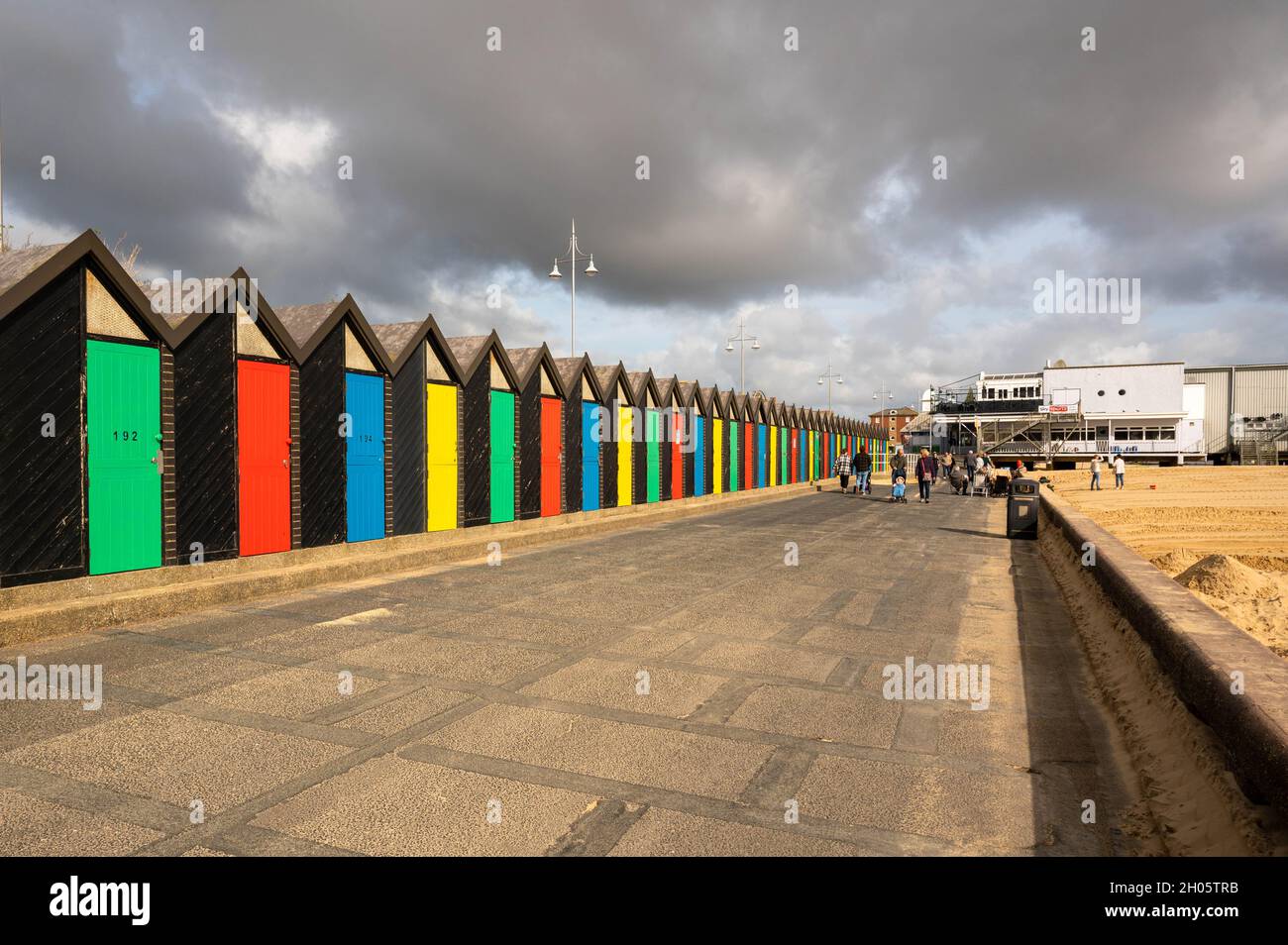 A view of the colourful beach huts on Lowestoft promenade sea front ...