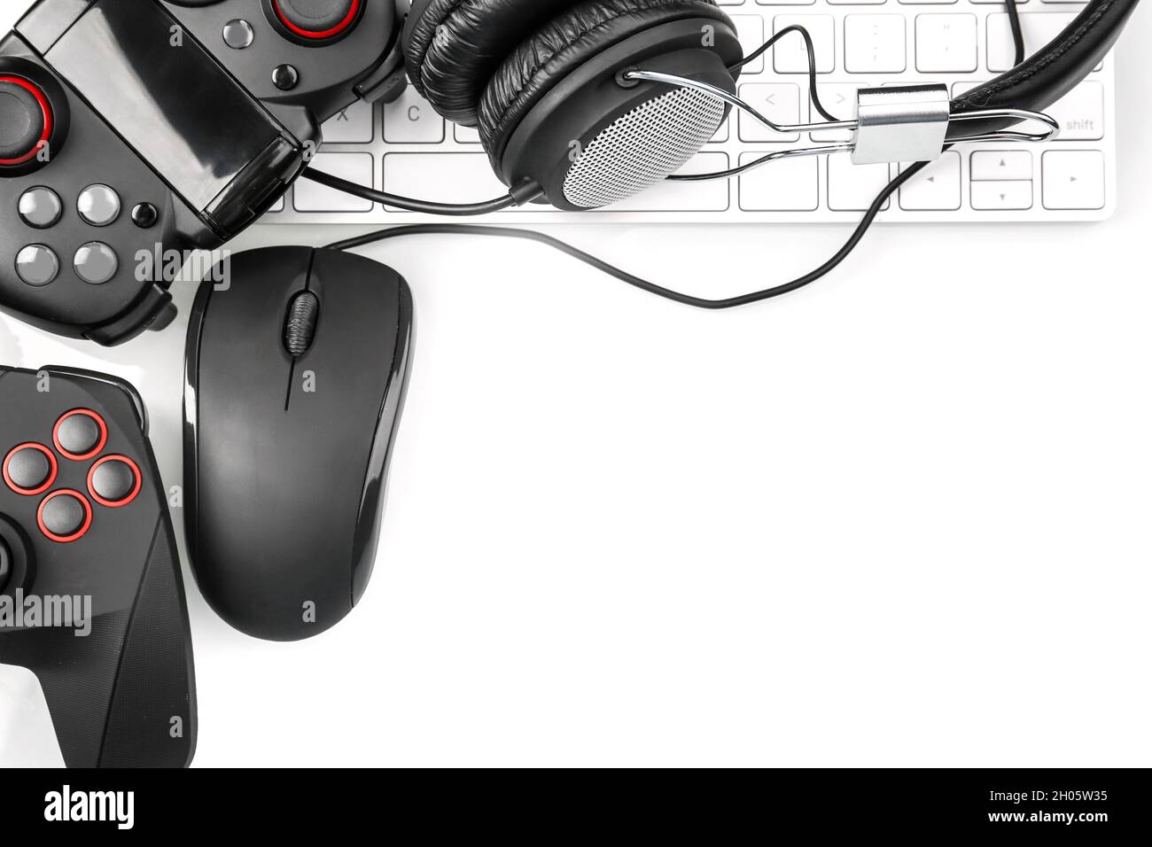 Flat lay composition with computer mouse and gaming gear on light ...