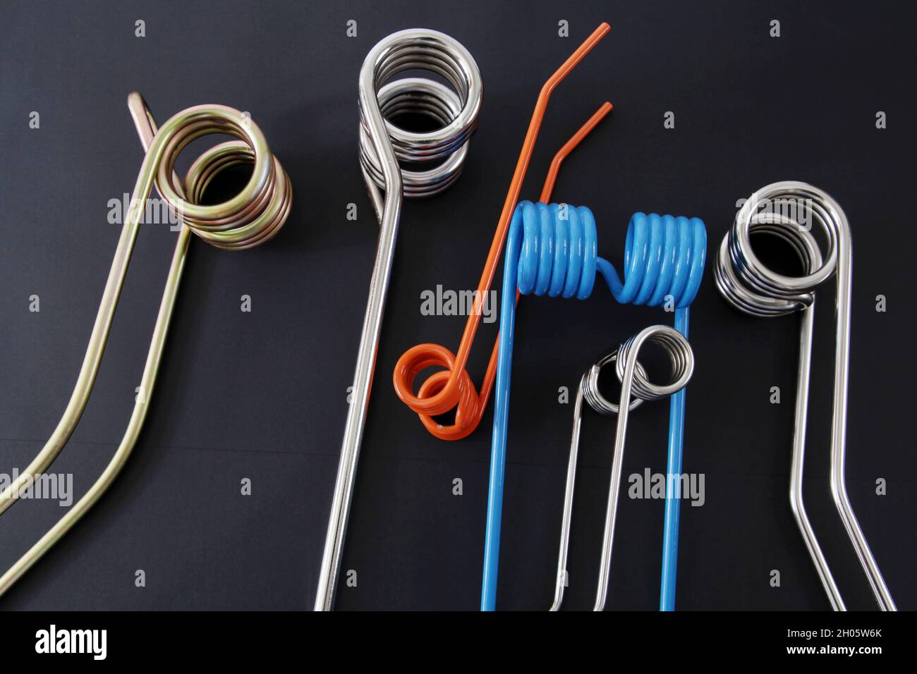 Metal springs in different sizes Stock Photo - Alamy