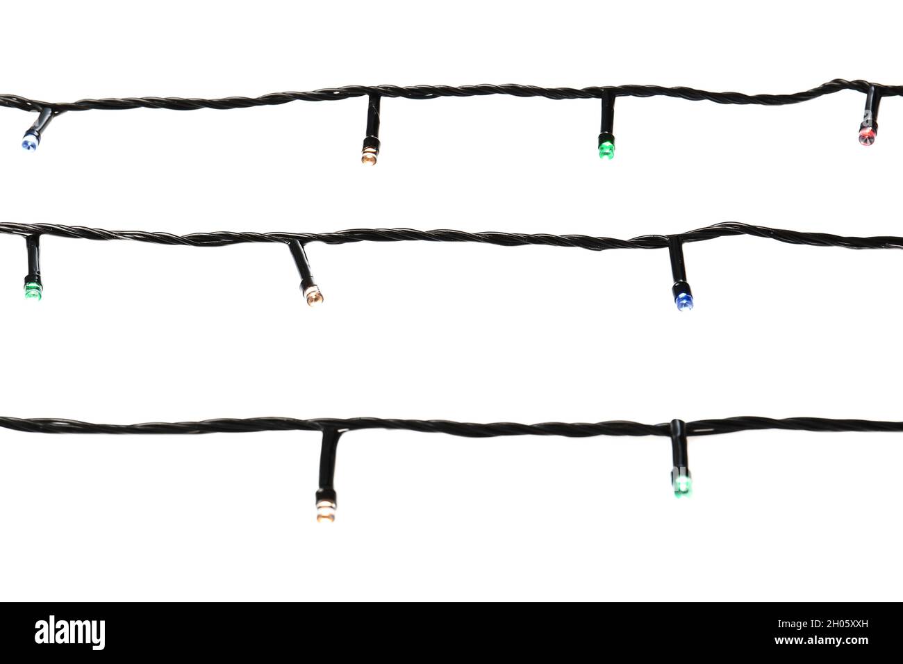 New string Christmas lights on white background Stock Photo - Alamy