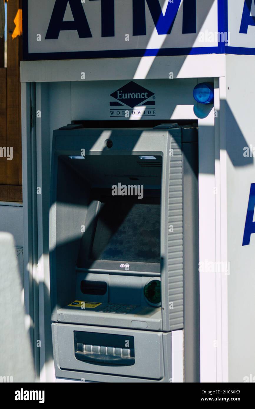 Santorini, Fira, Greece - October 10, 2021 ATM located in the streets ...