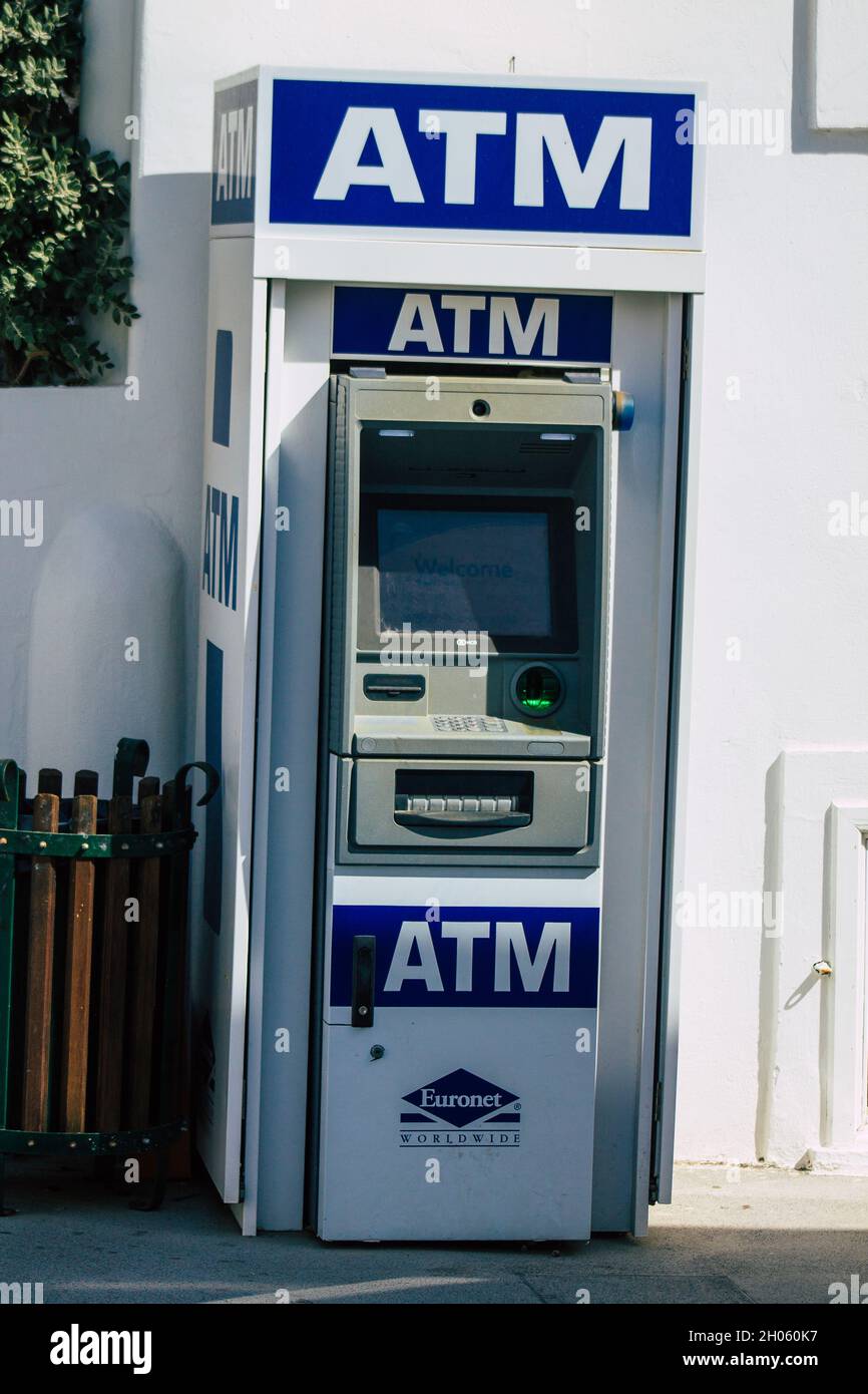 Santorini, Fira, Greece - October 10, 2021 ATM located in the streets ...