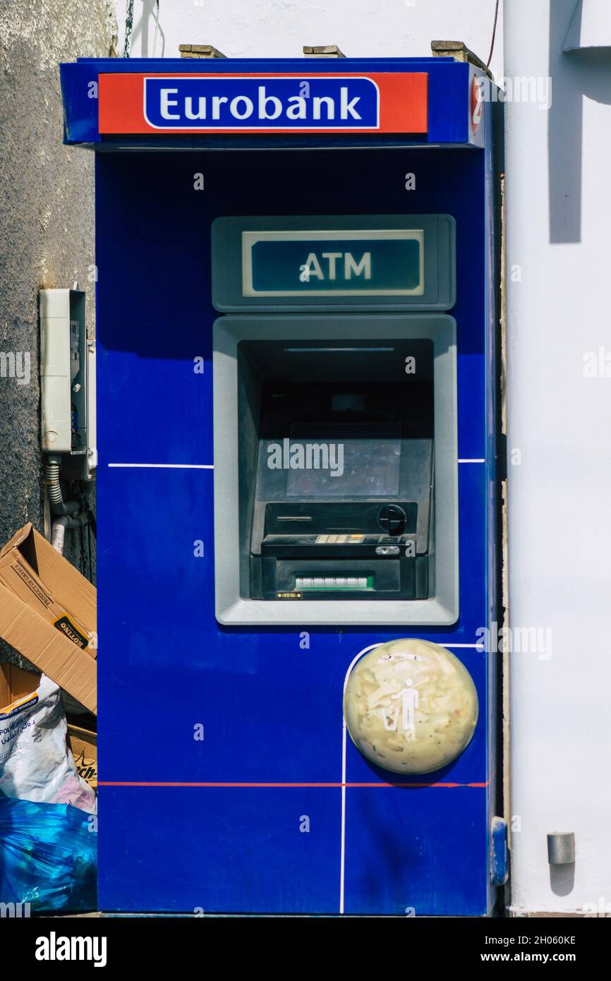 Santorini, Fira, Greece - October 10, 2021 ATM located in the streets ...