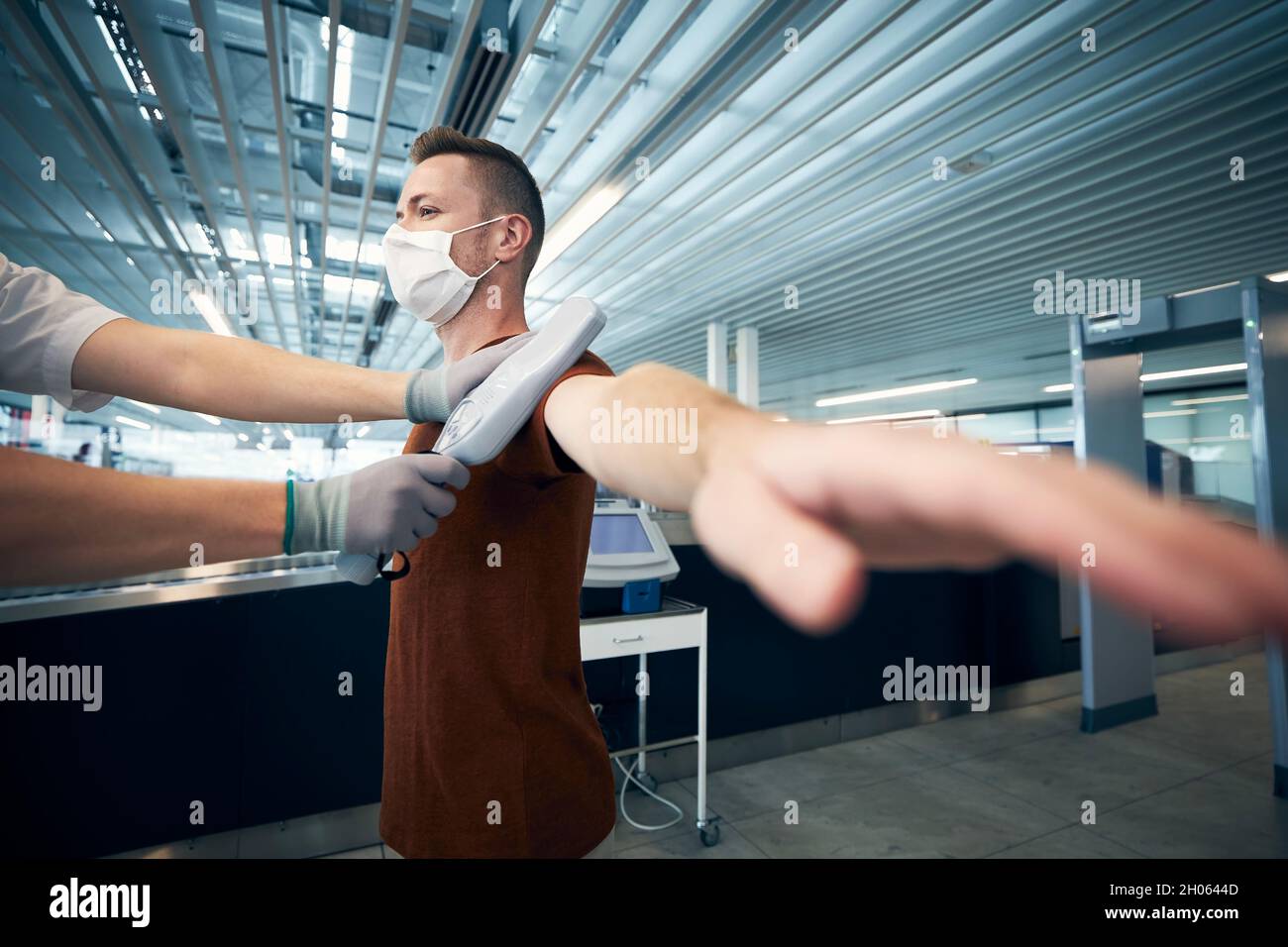 Airport security check. Portrait of passengers passing through control ...