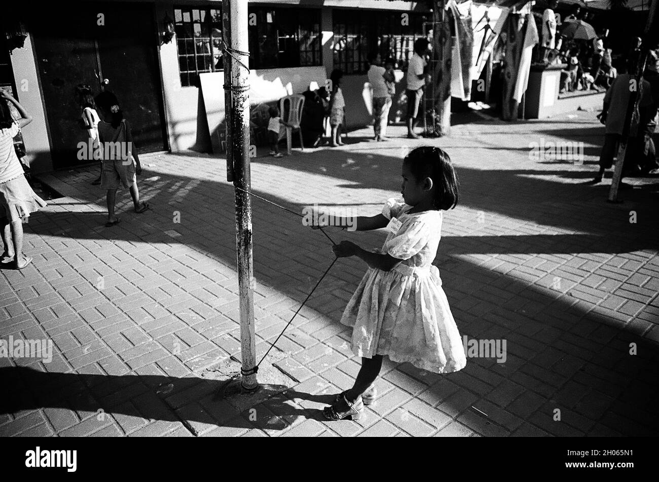 Children playing in the Gawan Kalinga compound in Baseco, an ...