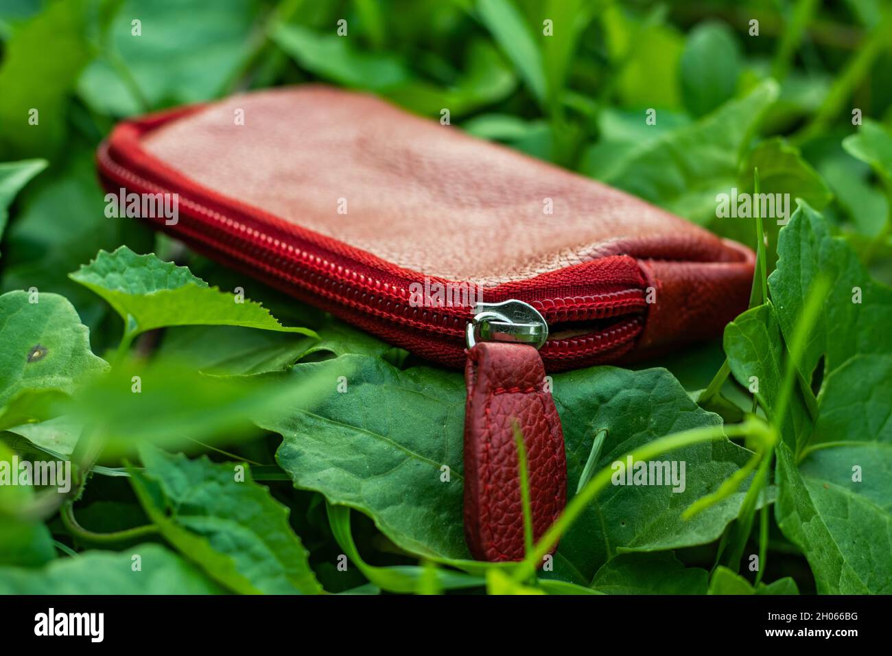 A red color leather key bag made in a factory-made of very high-quality ...