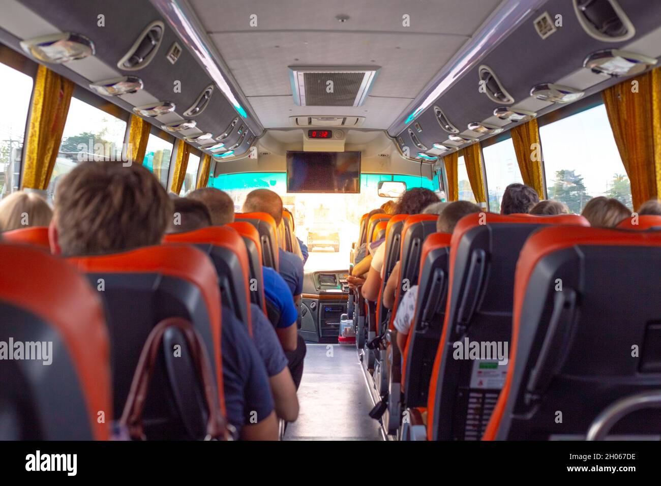 Tour bus interior tourists hi-res stock photography and images - Alamy