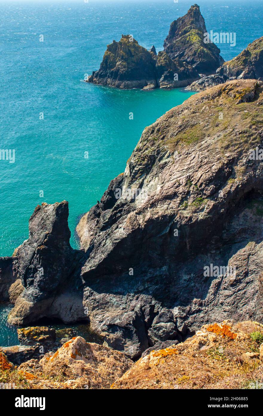 Rocky cliffs at Kynance Cove on the Lizard on the South West Coast Path ...