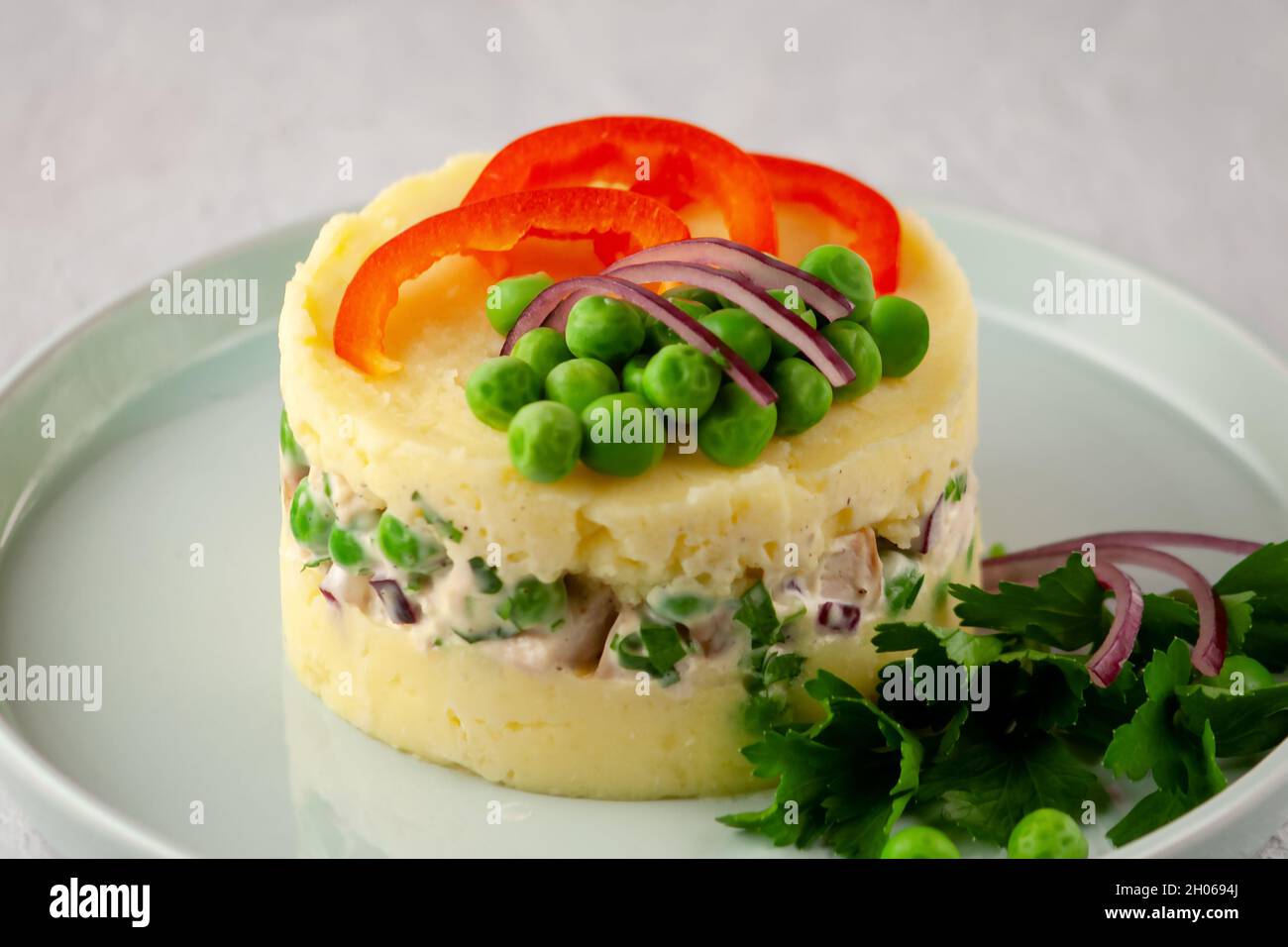 Causa stuffed with chicken. A traditional Peruvian dish Stock Photo - Alamy