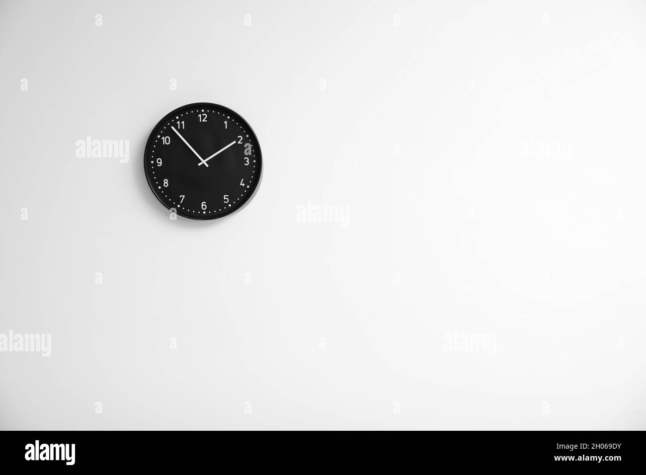 Stylish clock on white background. Time concept Stock Photo - Alamy