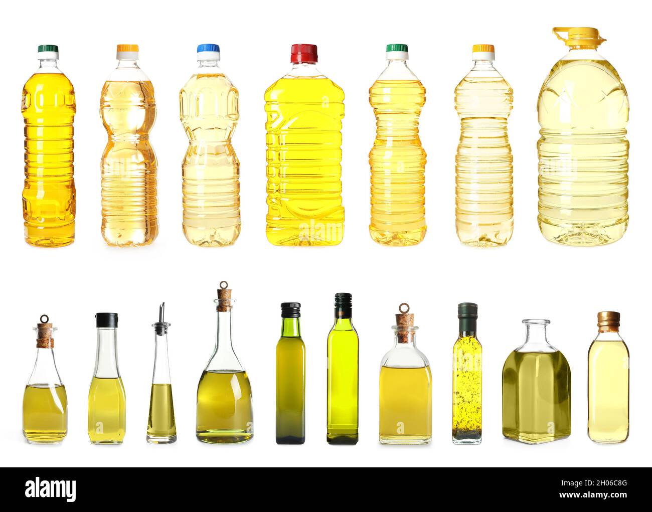 Set with different bottles of oil on white background Stock Photo - Alamy