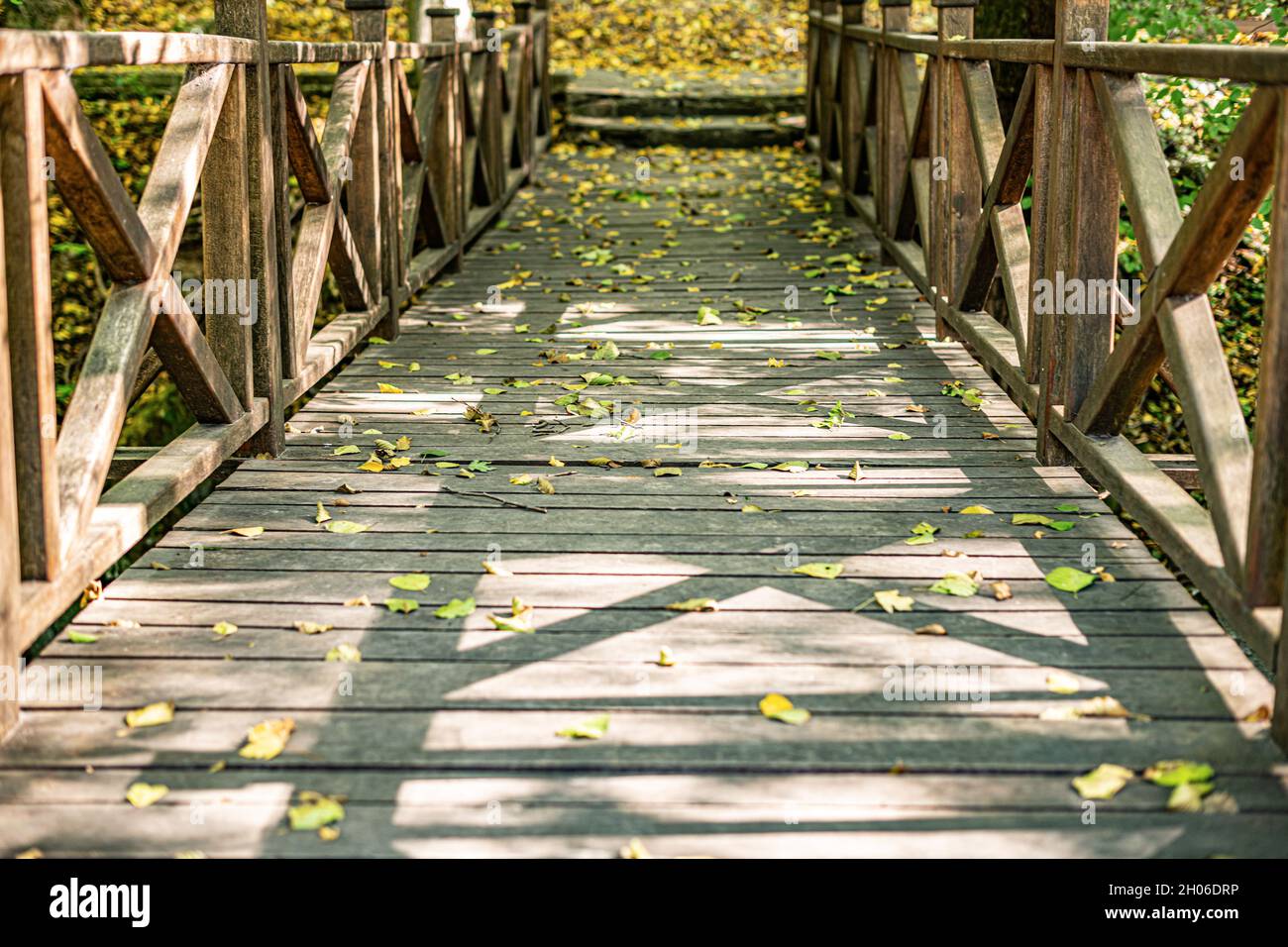 Wooden bridge over the stream Stock Photo - Alamy