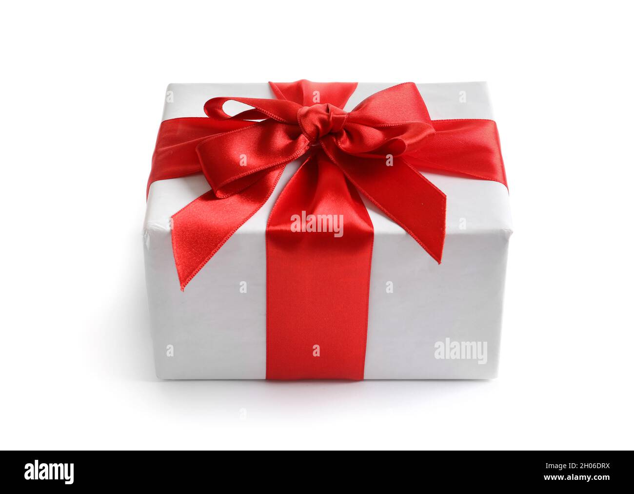 Beautifully wrapped gift box on white background Stock Photo - Alamy