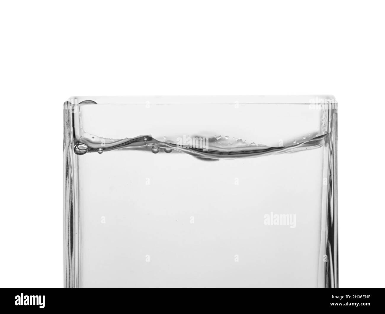 Glass of cold refreshing water on white background Stock Photo - Alamy
