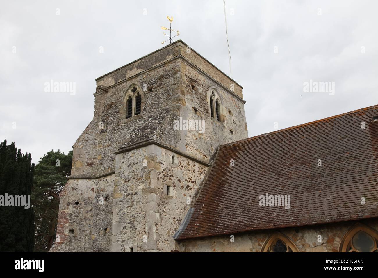 The 14th century stone tower of The Church of St. Mary the Virgin ...