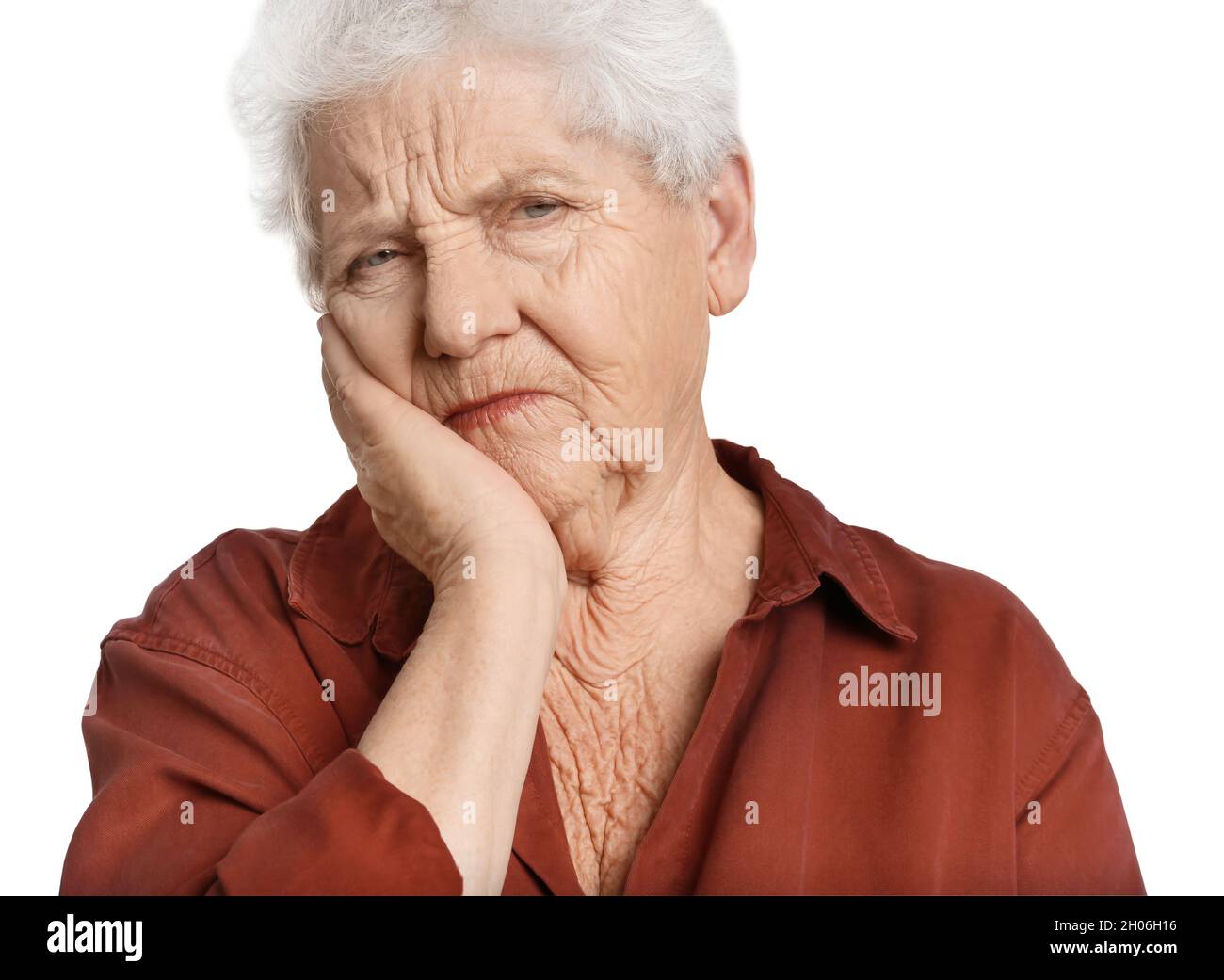 Elderly woman suffering from tooth ache on white background Stock Photo ...