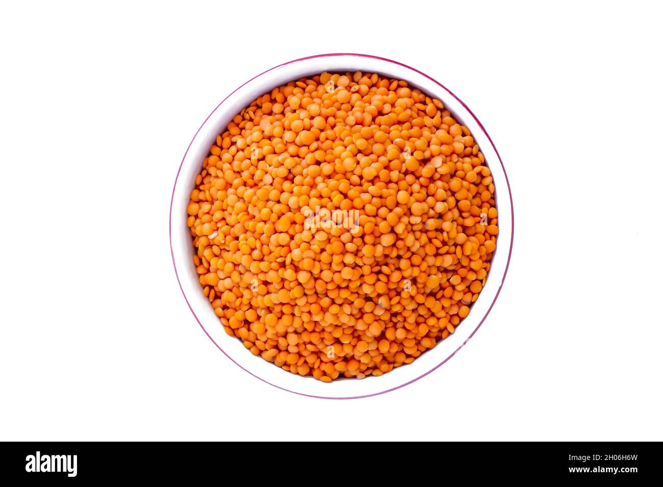 Red lentil grains, top view of raw red lentil grains in bowl on ...