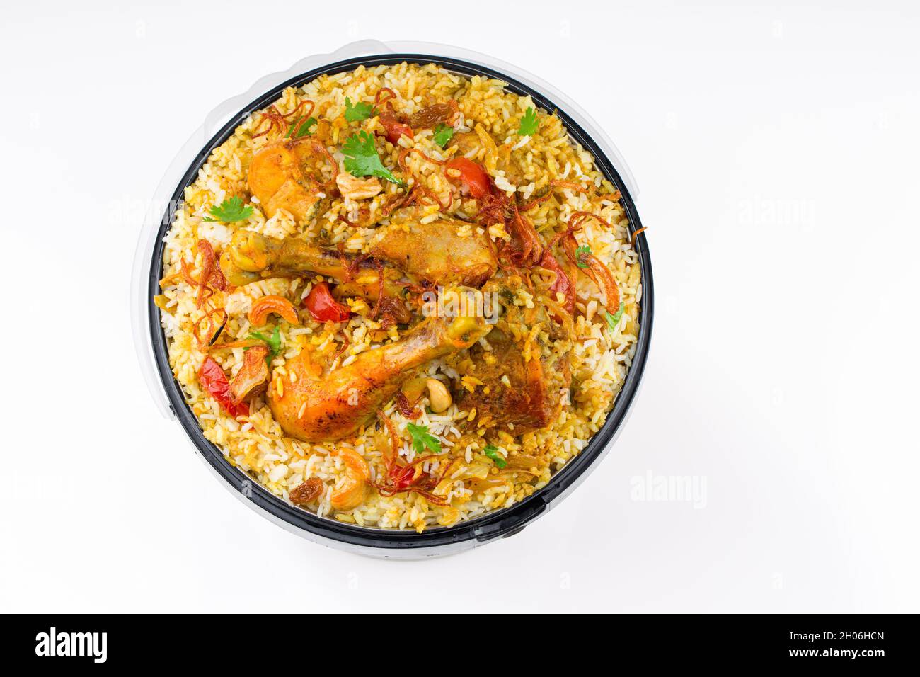 Chicken Bucket Biryani, Kerala dum chicken biryani arranged in a black ...