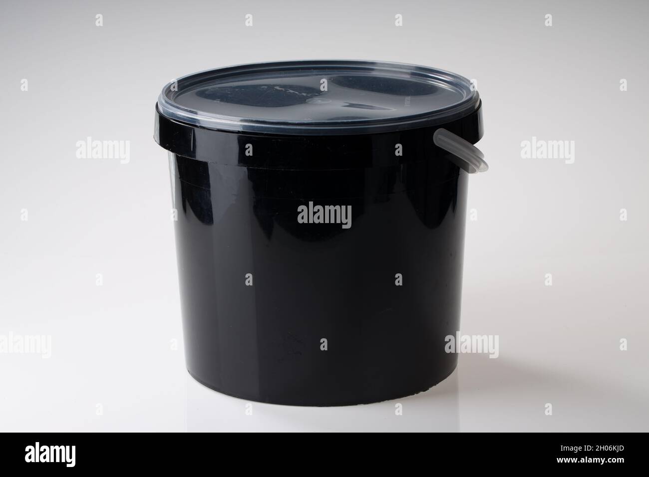 Bucket Biryani Container ,black biryani pot with white background Stock ...