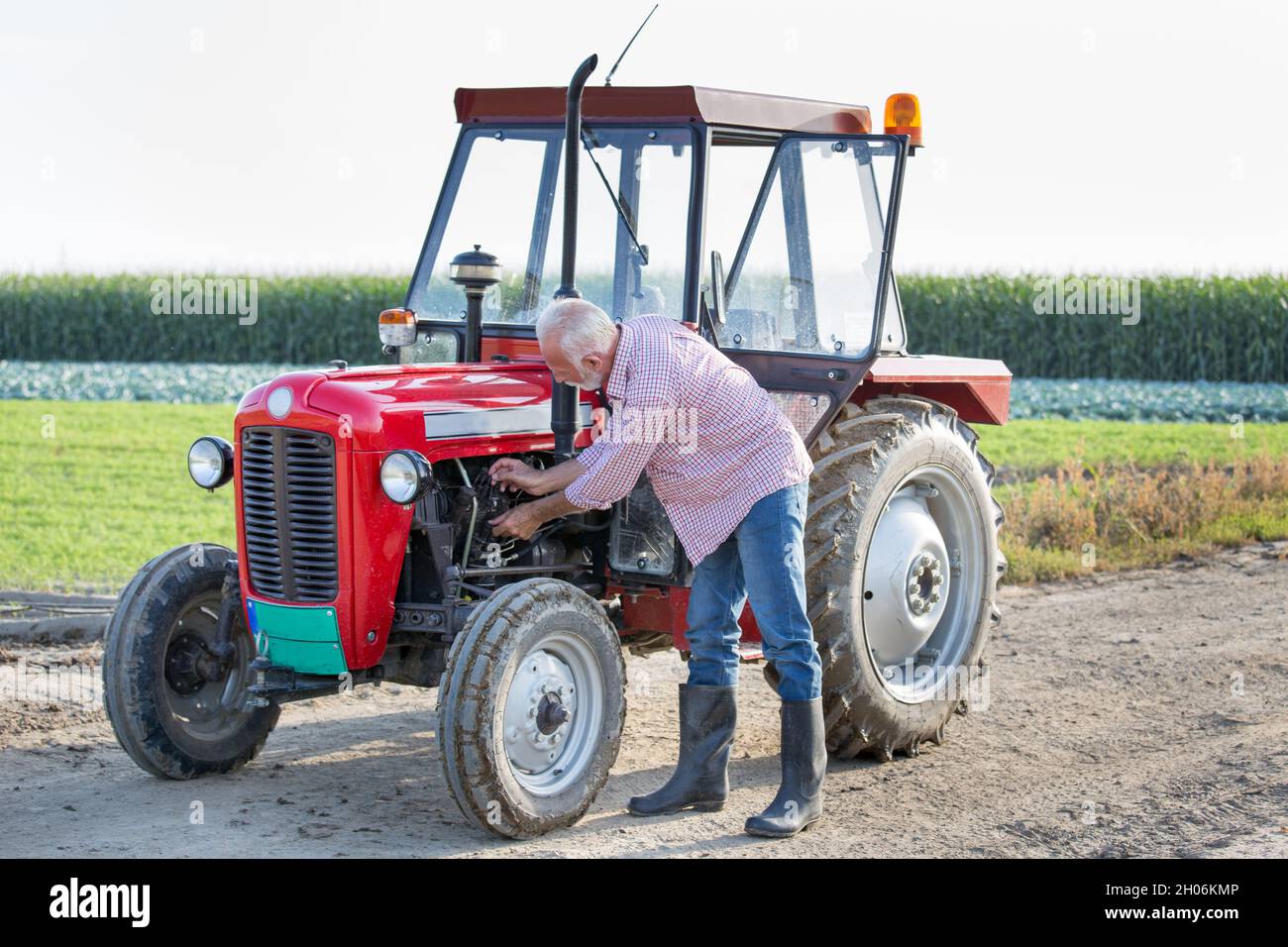 Repairing tractor hi-res stock photography and images - Alamy