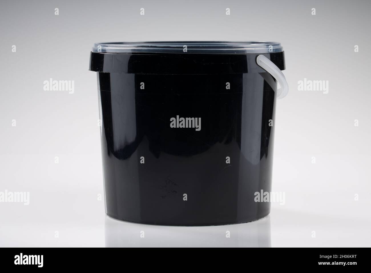 Bucket Biryani Container ,black biryani pot with white background Stock ...