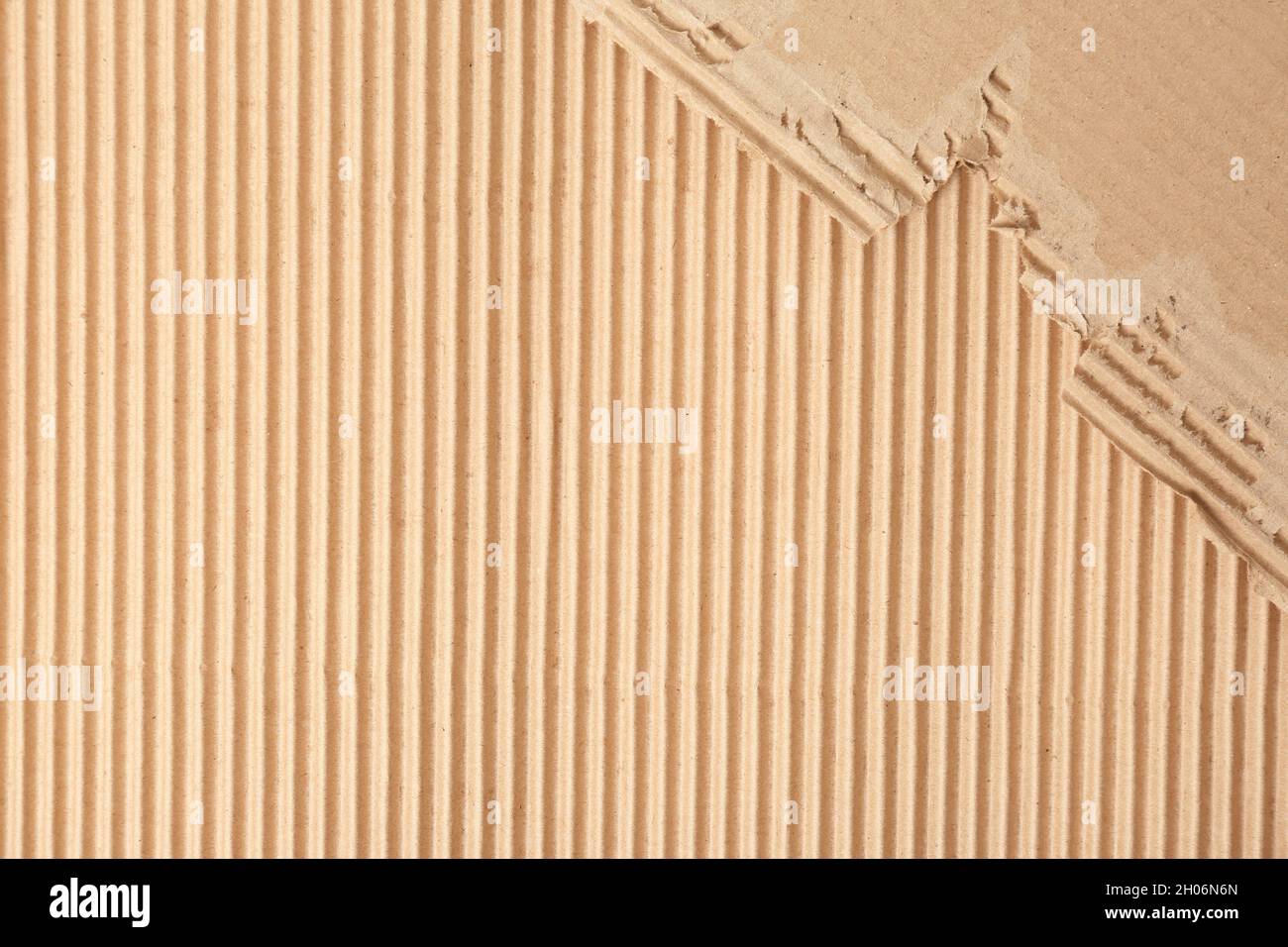 Corrugated cardboard as background, top view with space for text ...