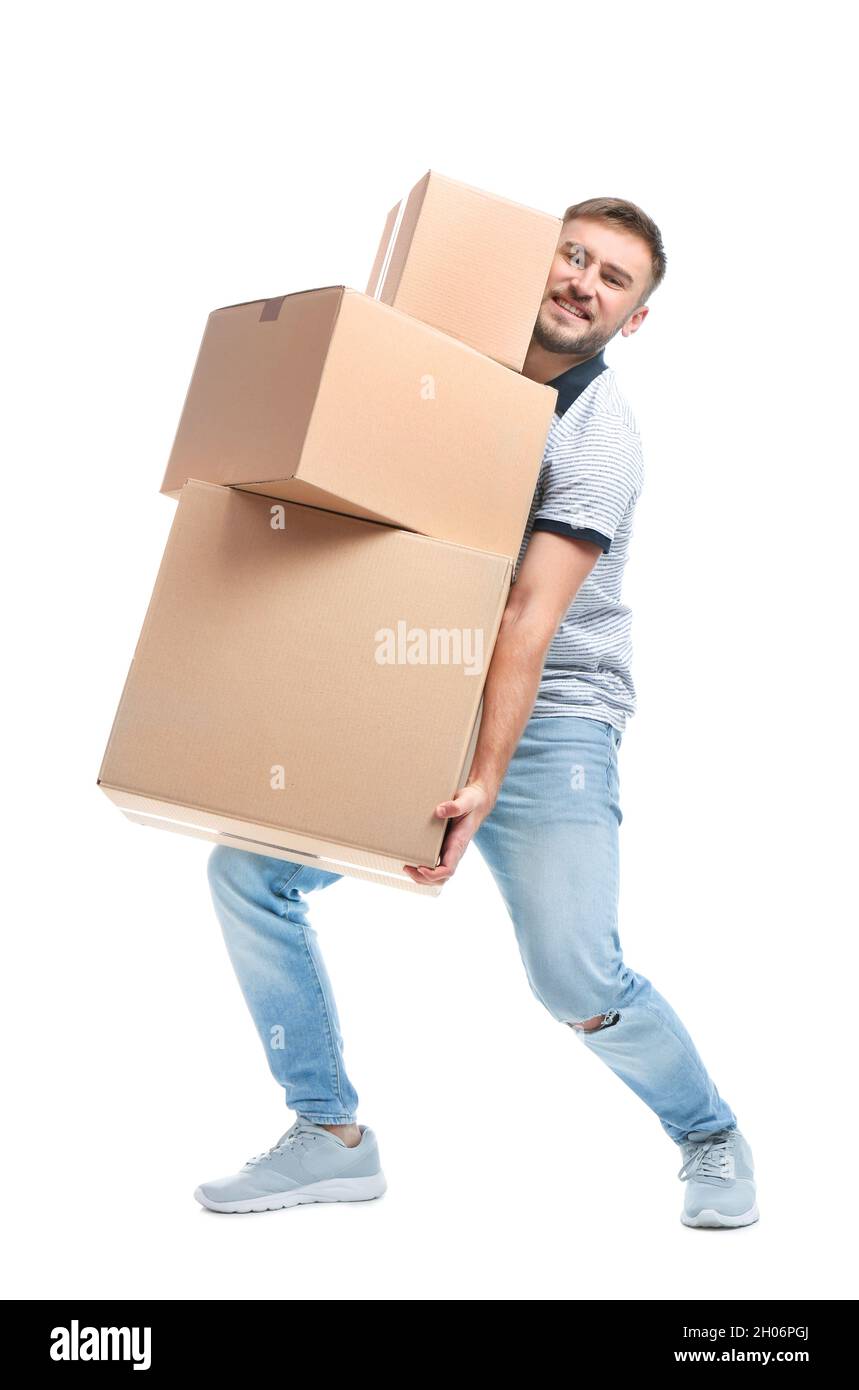 Man lifting heavy boxes Cut Out Stock Images & Pictures - Alamy
