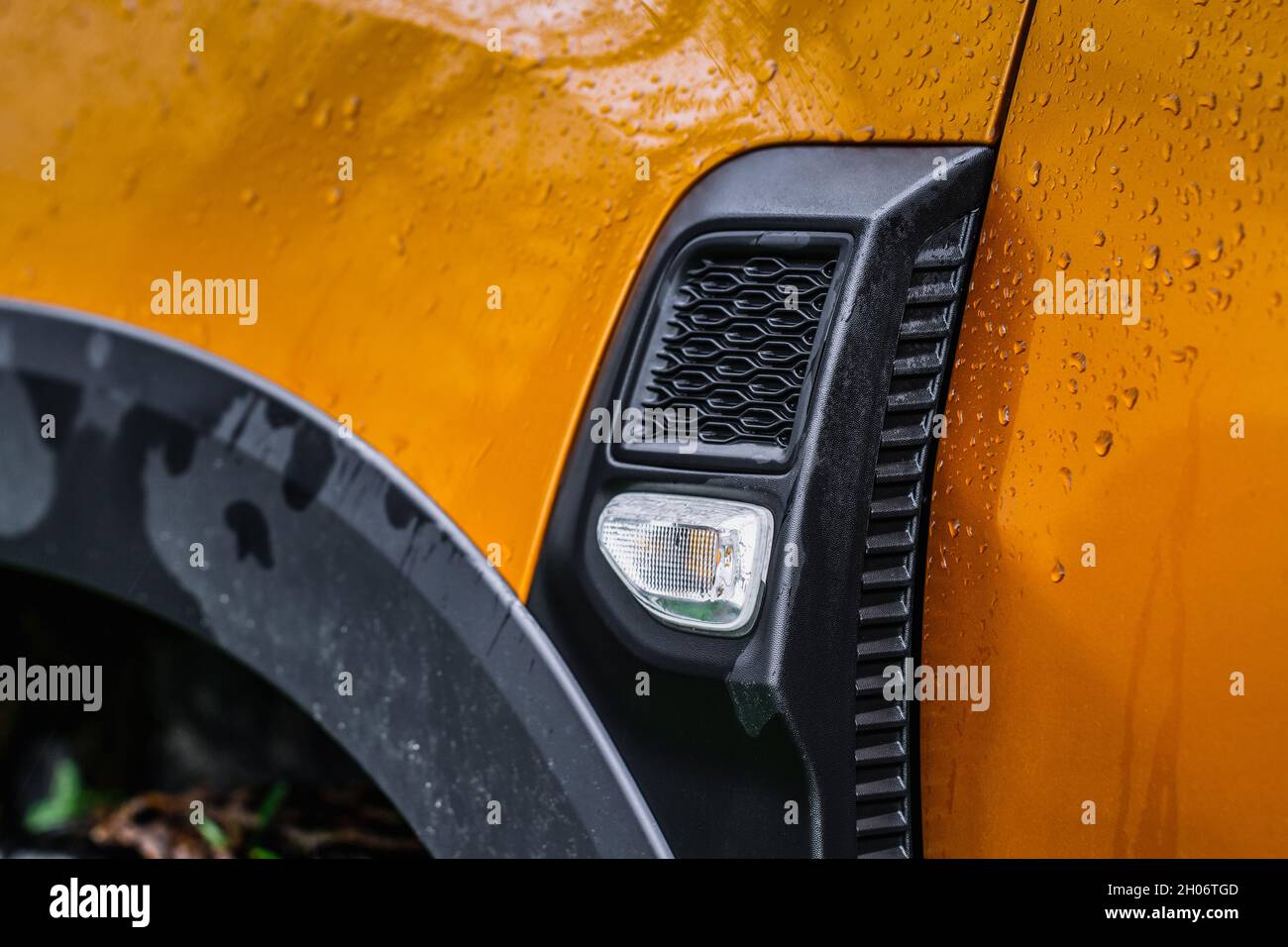 Modern SUV turn signal. Car turn signal close up. Close up of the left ...