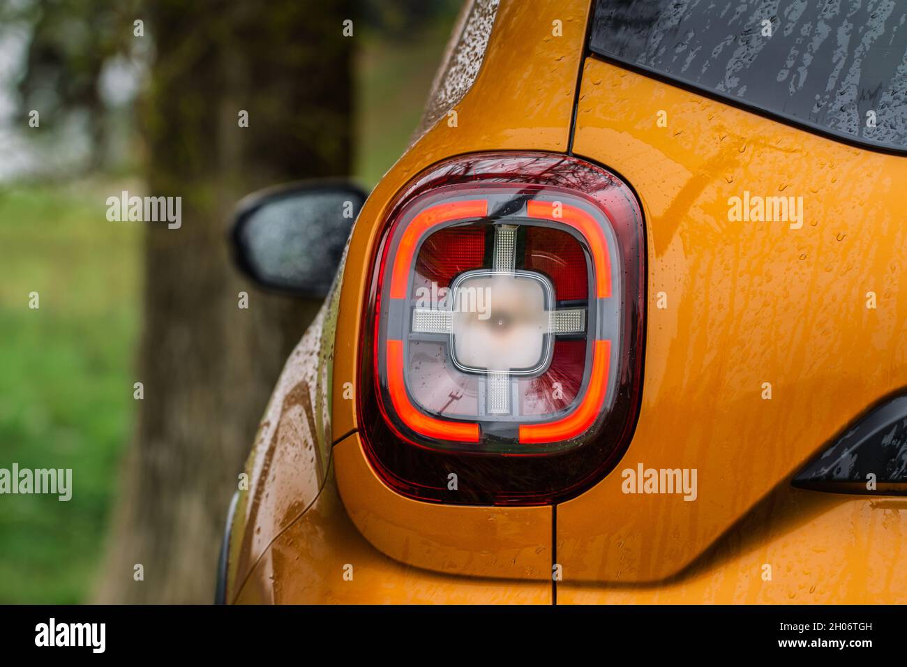 Modern rear light of a car. Brake light and arrow of large suv. Rear ...
