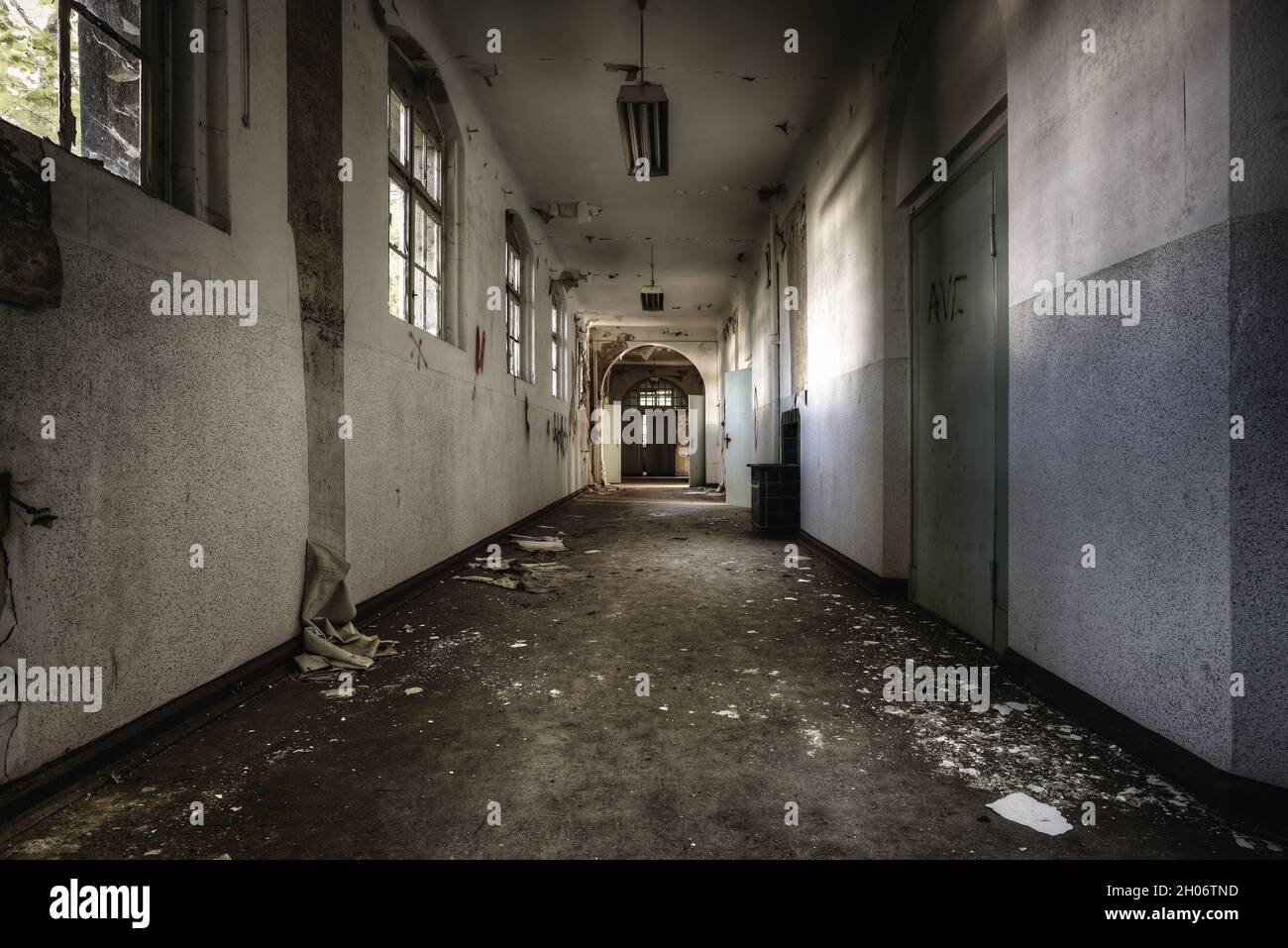 Shot of an abandoned and damaged hallway Stock Photo - Alamy