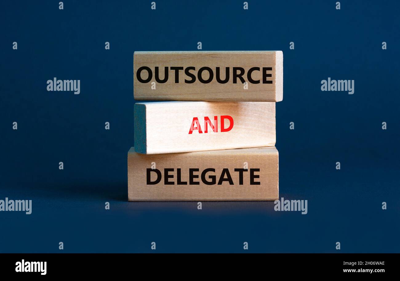 Outsource and delegate symbol. Concept words 'Outsource and delegate ...