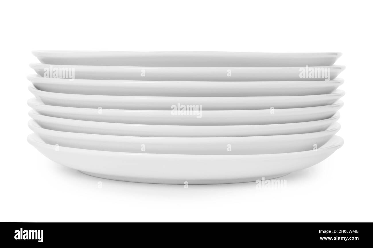 Stack of clean plates on white background. Washing dishes Stock Photo ...