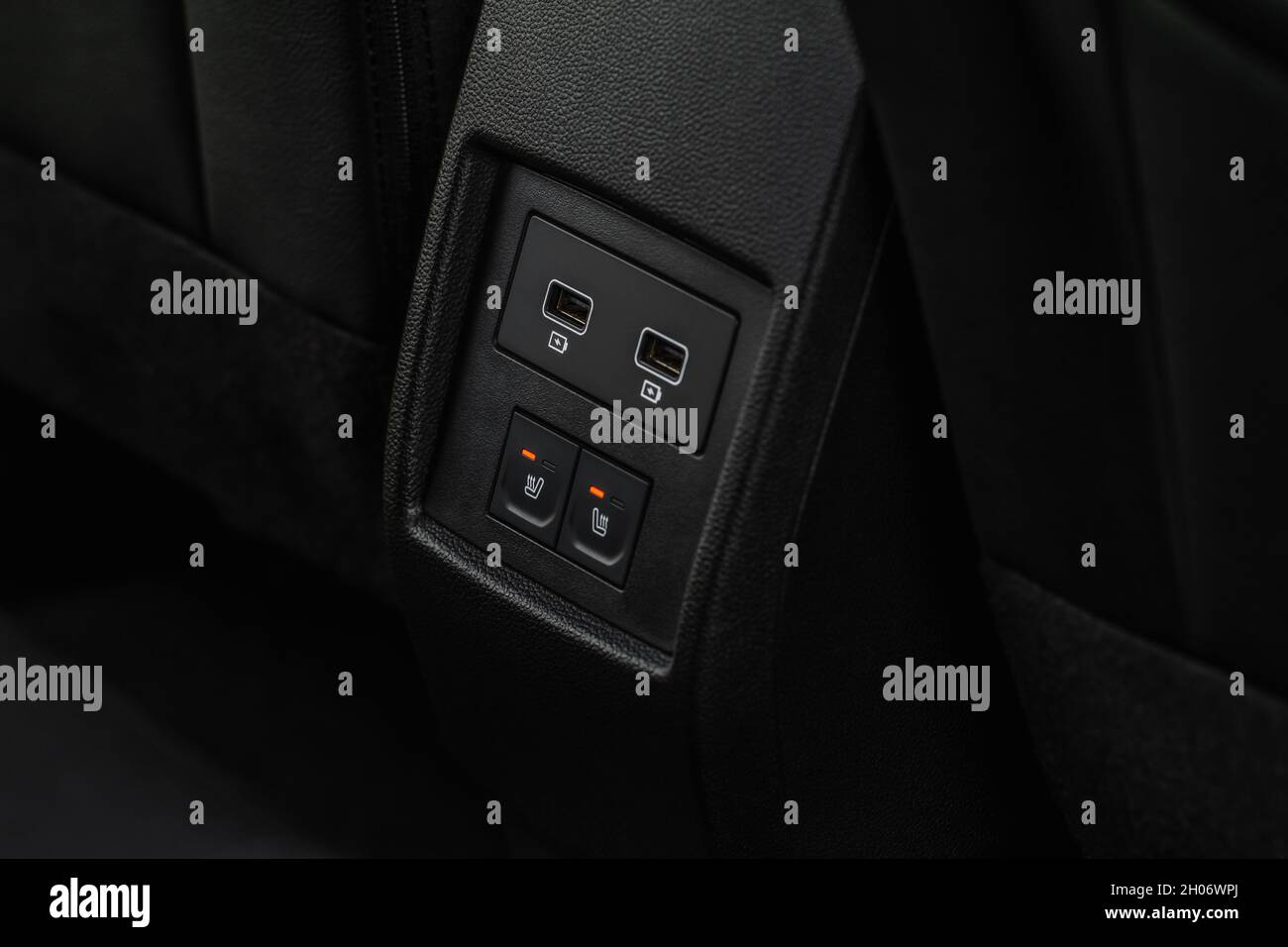 Seat heating in the car switched on. Car seat heating button Stock ...