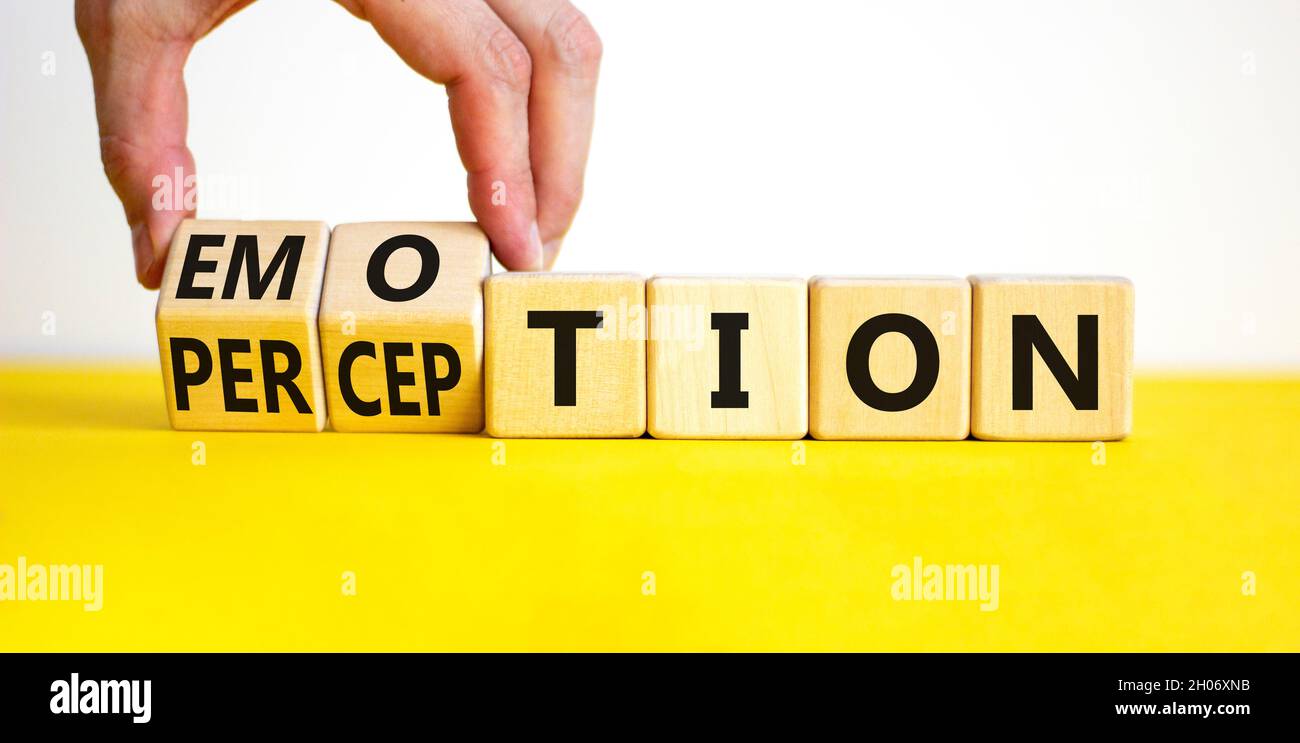 Emotion and perception symbol. Businessman turns wooden cubes and ...