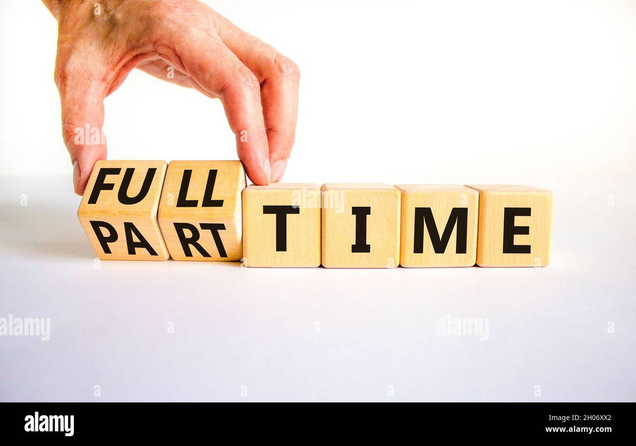 Full or part time symbol. Businessman turns wooden cubes and changes ...