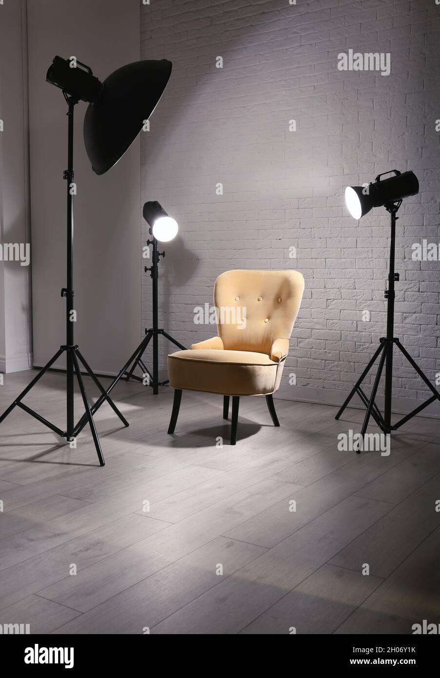 Interior of modern photo studio with professional lighting equipment ...