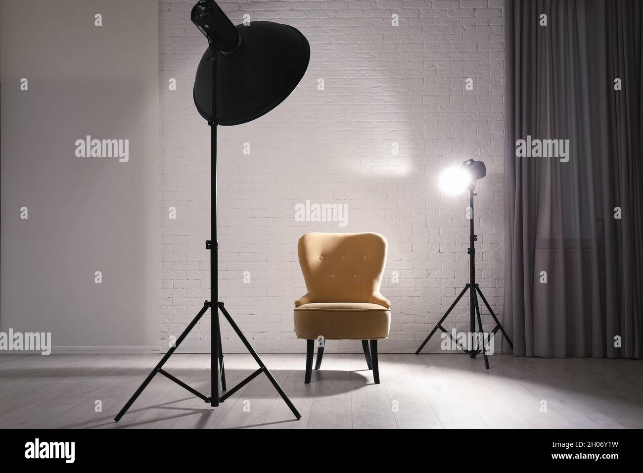 Interior of modern photo studio with professional lighting equipment ...