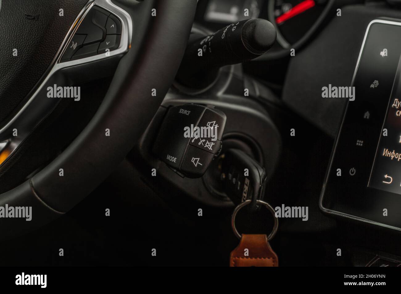 Steering wheel buttons hi-res stock photography and images - Alamy
