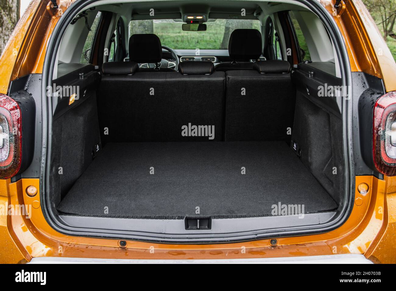 Huge, clean and empty car trunk in interior of a modern compact suv ...