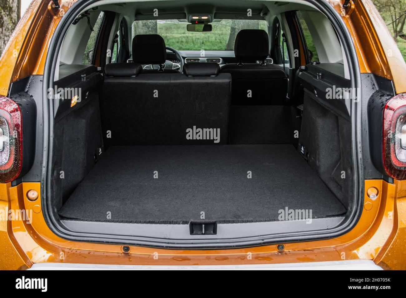 Huge, clean and empty car trunk of a modern compact suv. Rear view of a ...